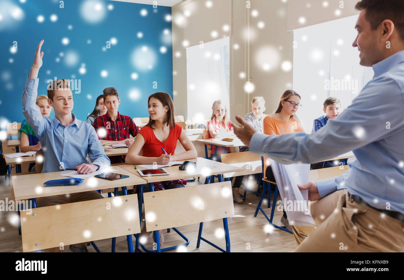 group of students and teacher with papers or tests Stock Photo - Alamy