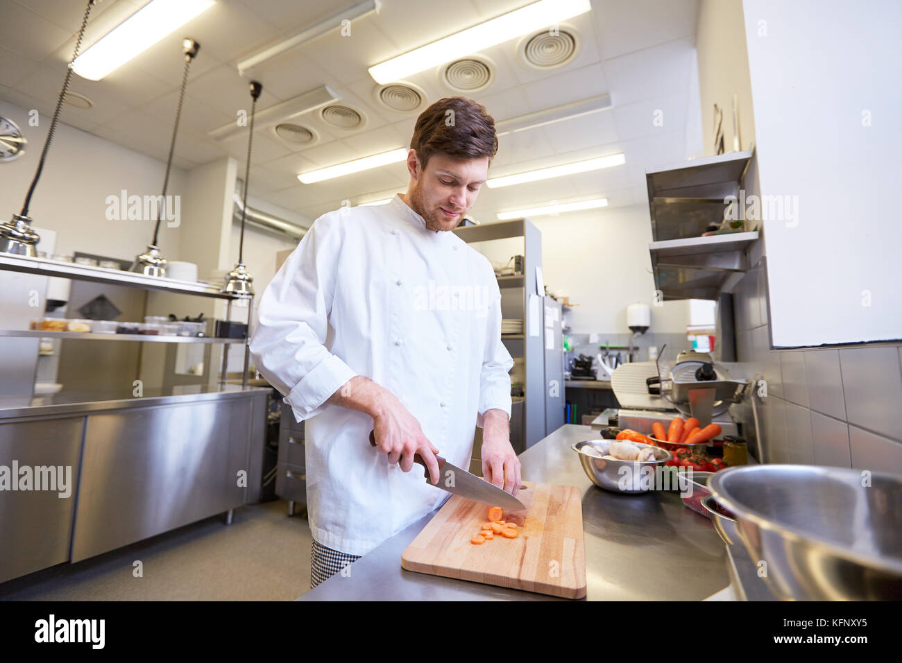 happy male chef cooking food at restaurant kitchen Stock Photo - Alamy