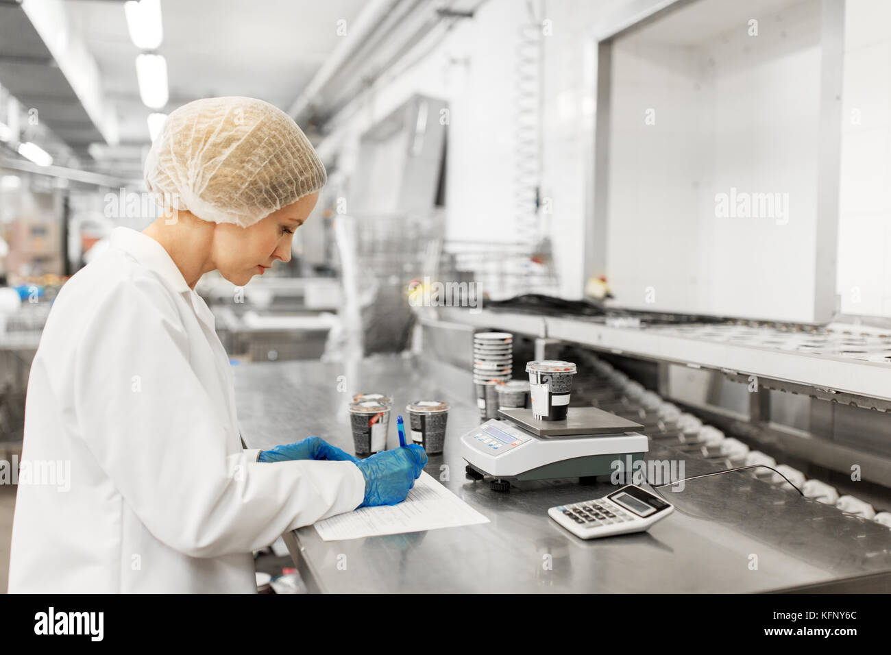 woman working at ice cream factory Stock Photo - Alamy
