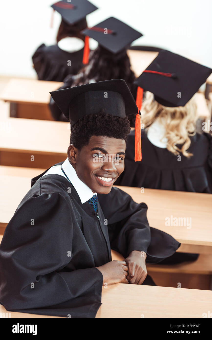 african american student in graduation costume Stock Photo - Alamy