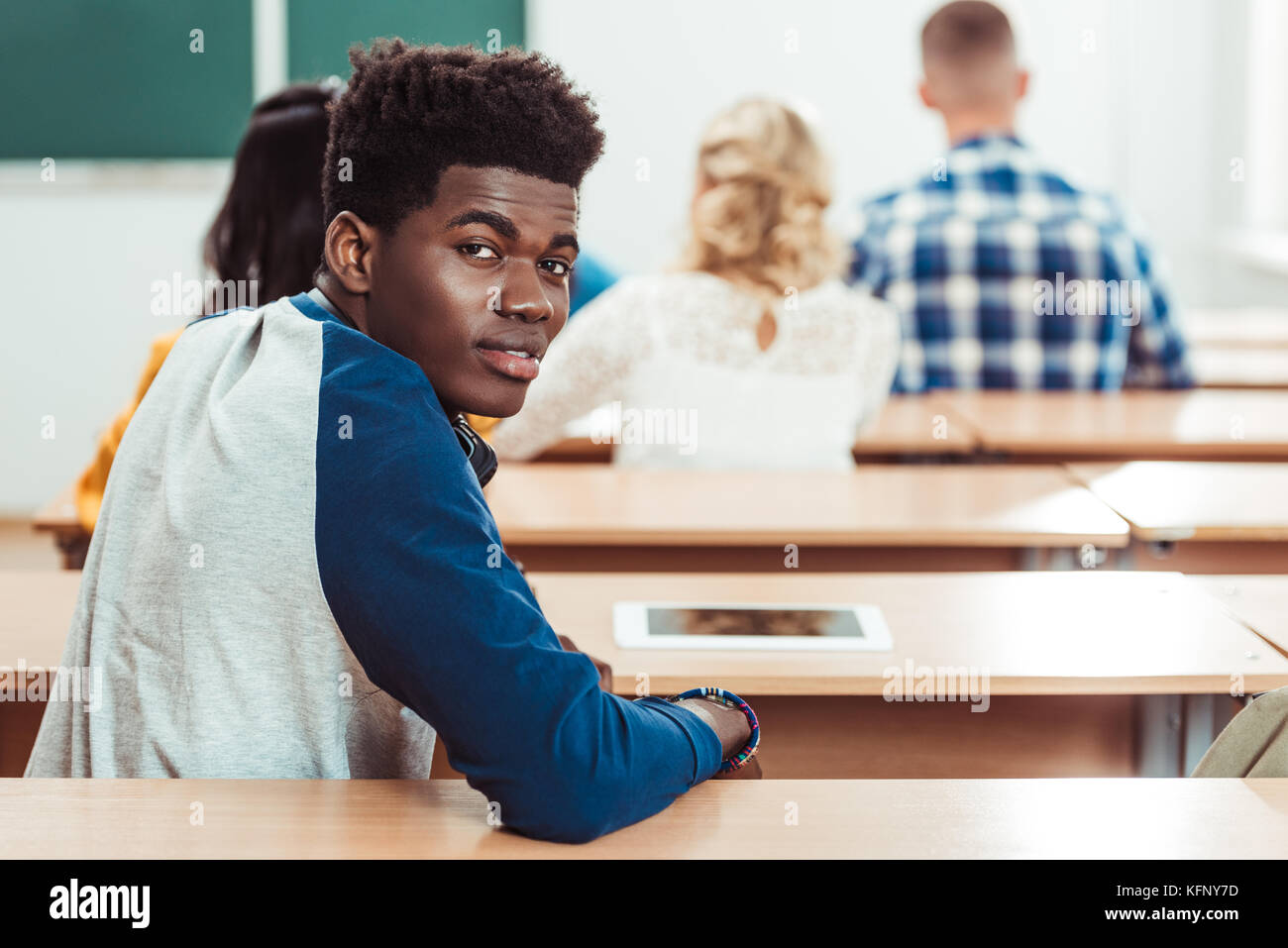 student sitting in classroom Stock Photo - Alamy