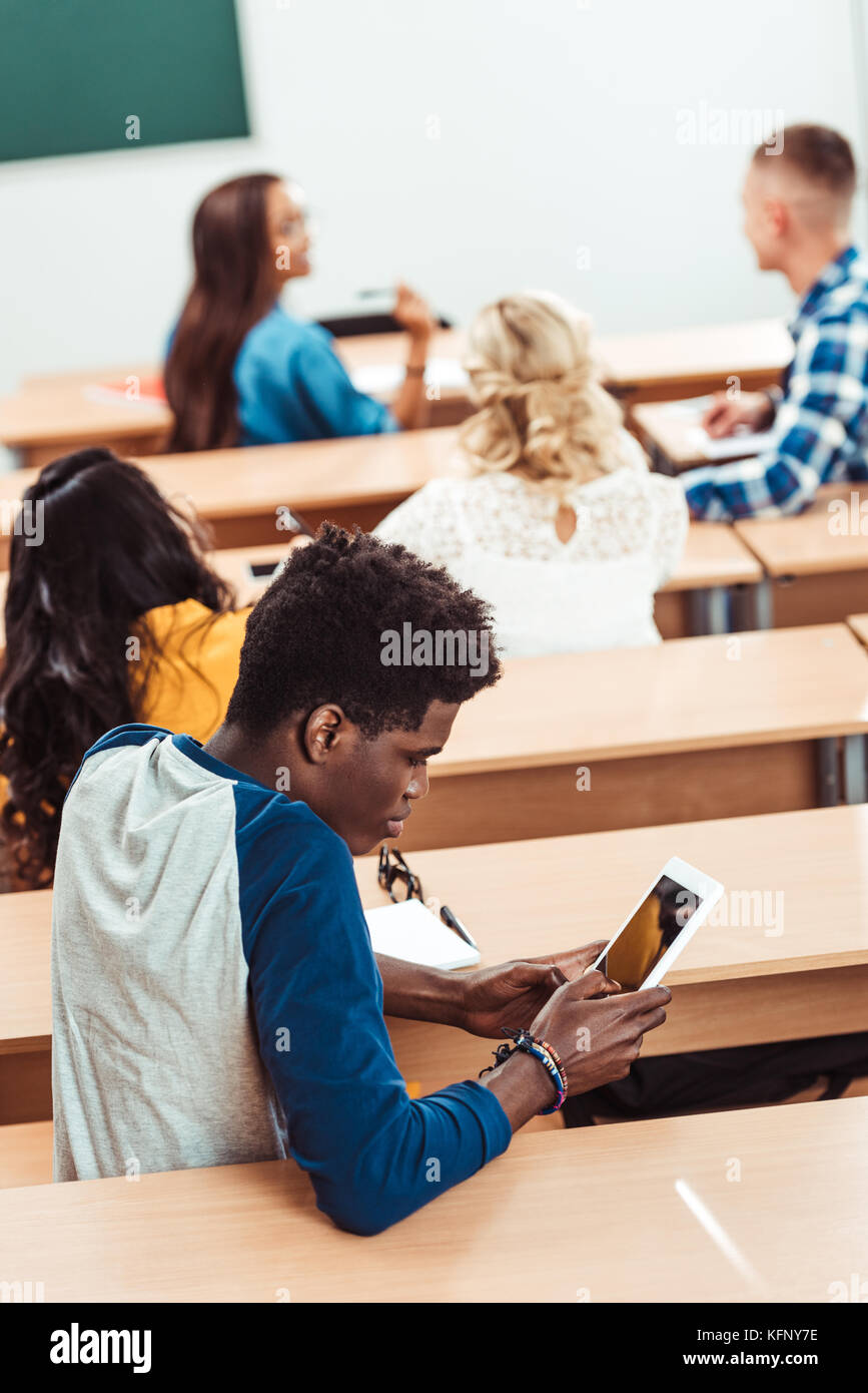 student using tablet on lecture Stock Photo - Alamy