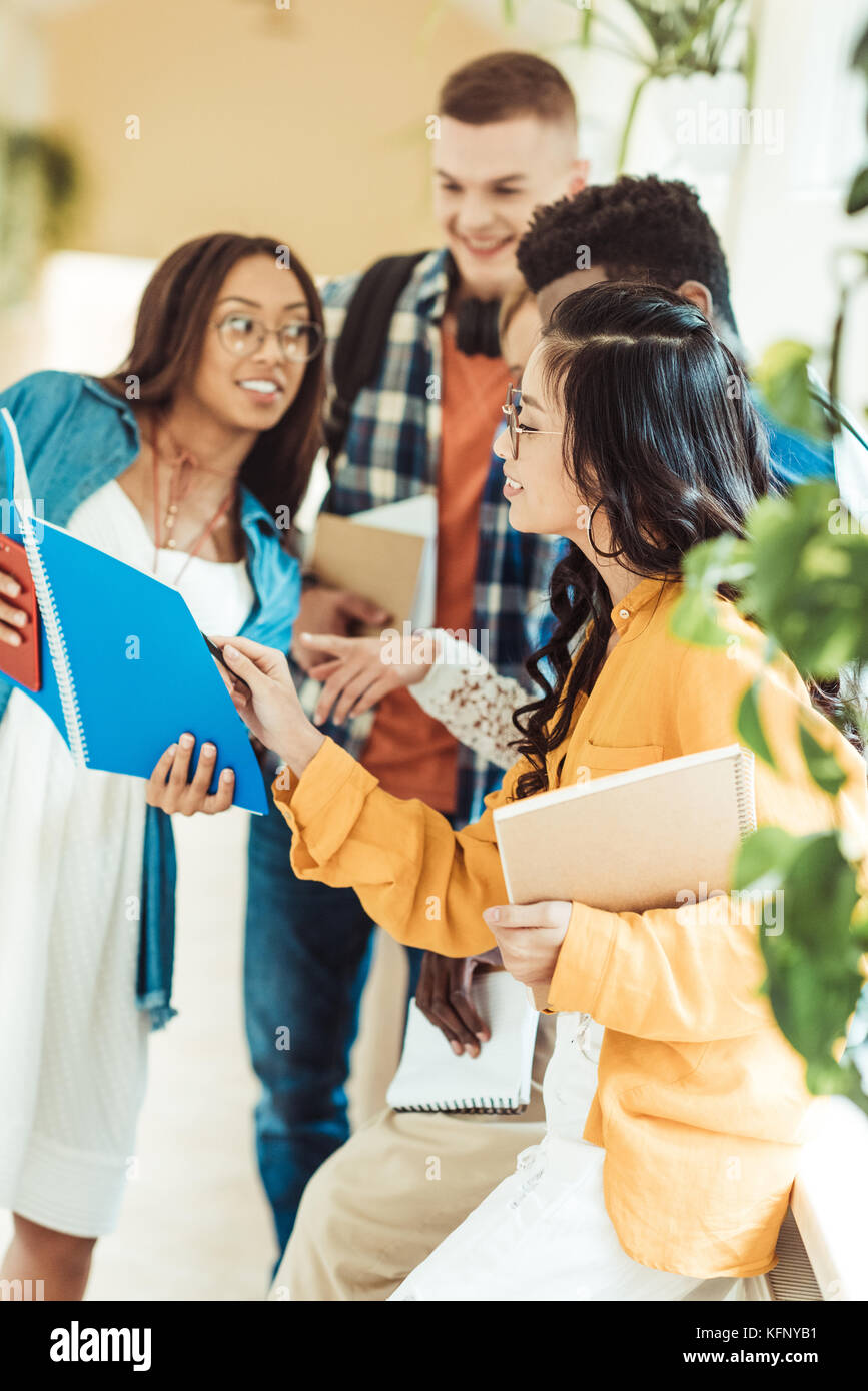students talking about homework Stock Photo - Alamy