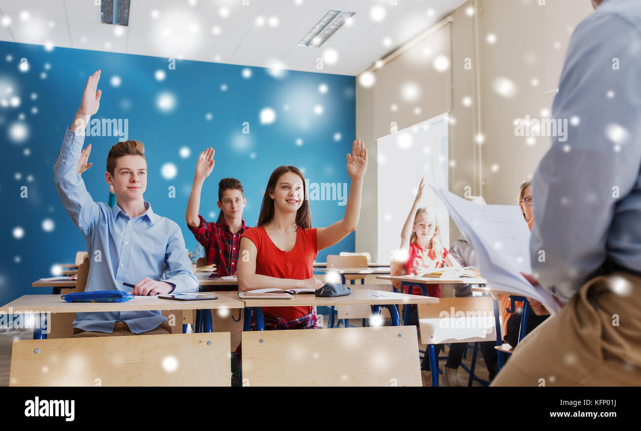 group of students and teacher with papers or tests Stock Photo - Alamy