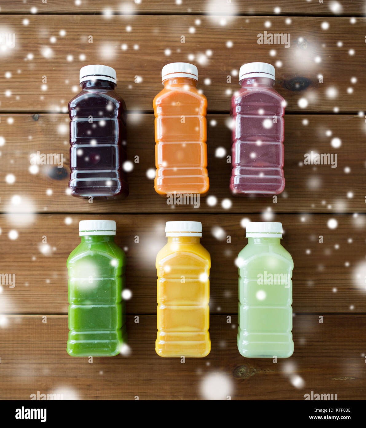 bottles with different fruit or vegetable juices Stock Photo - Alamy