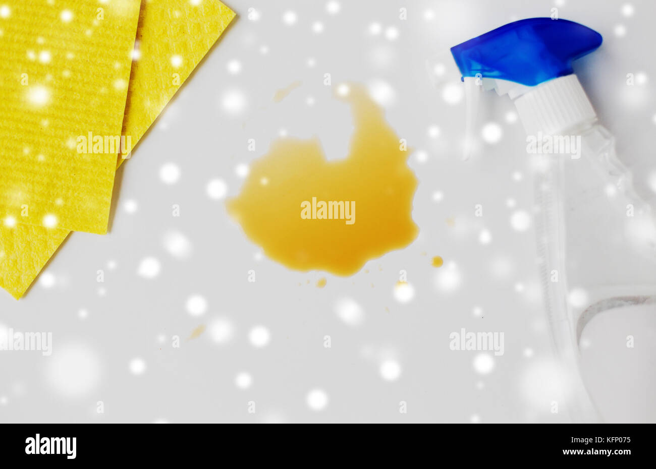 cleaning rag, detergent spray and spilled stain Stock Photo - Alamy