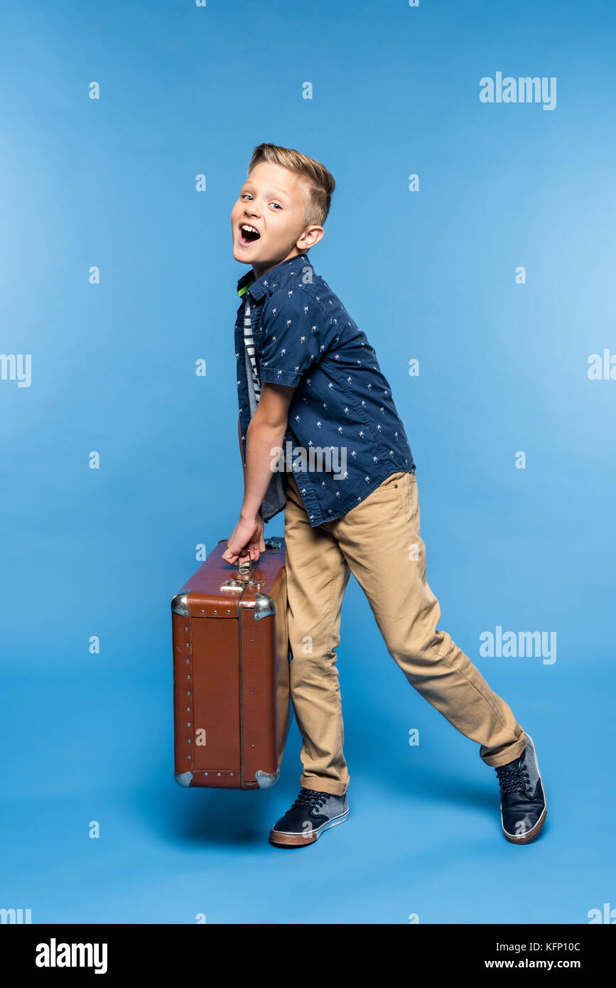 boy with suitcase Stock Photo - Alamy
