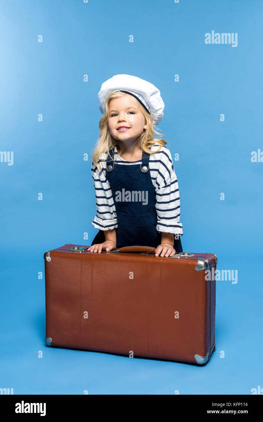 adorable child with suitcase Stock Photo - Alamy