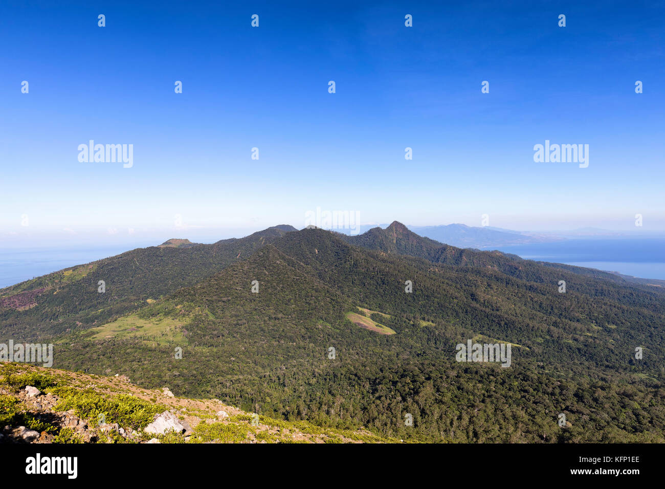 View of mountains westward near the town of Maumere from Mount Egon on ...