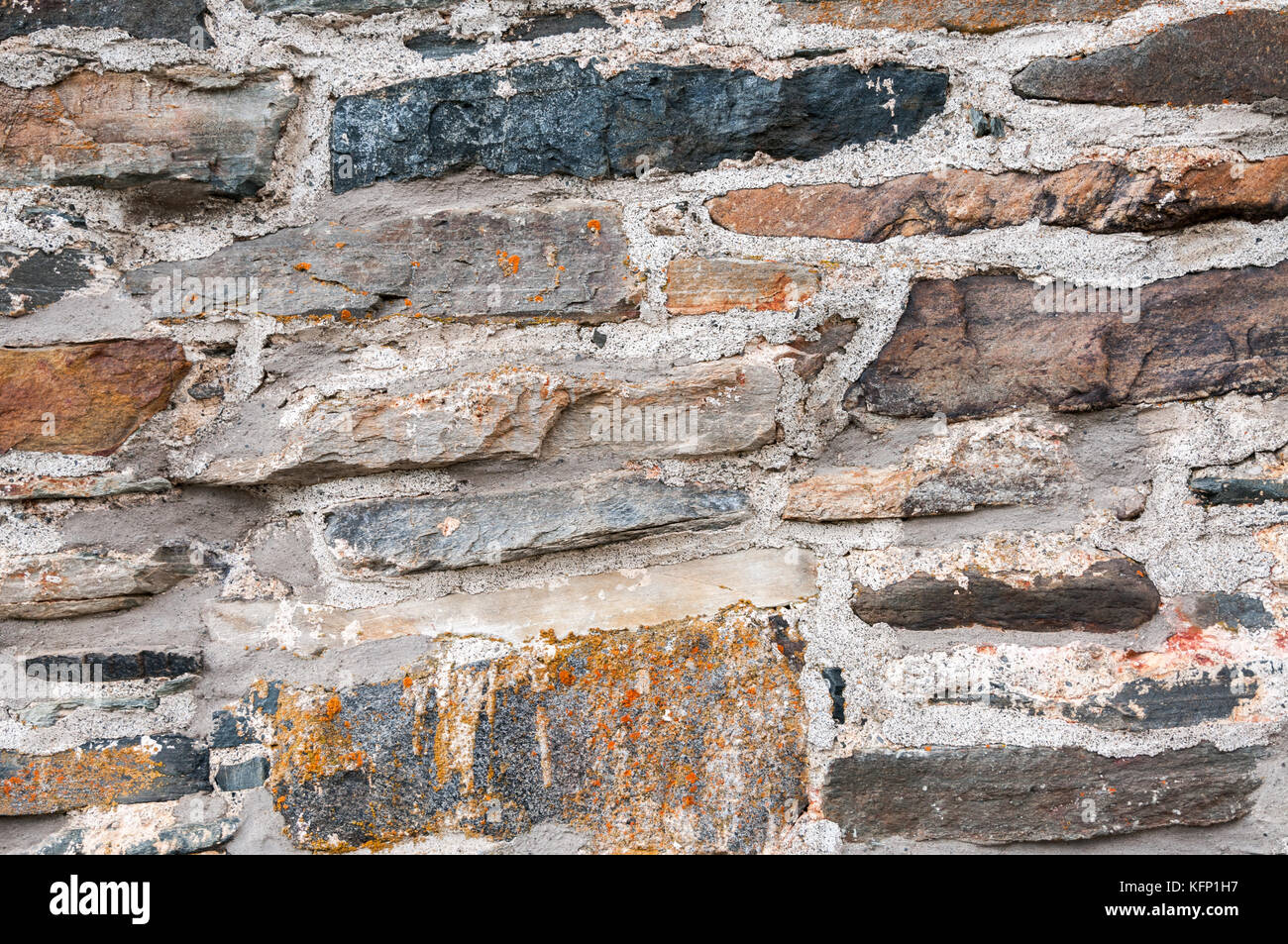 Close up of a unplastered stone wall Stock Photo - Alamy