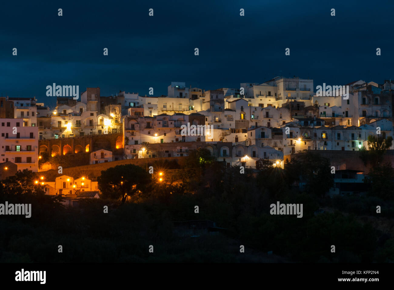 A night view of the village of Pisticci, Italy. Pisticci is a town in ...