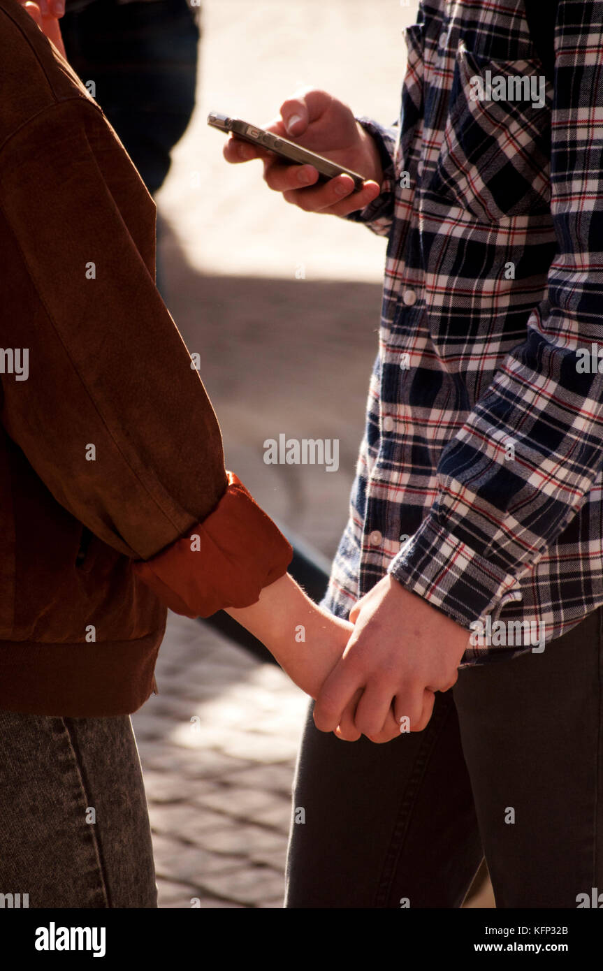Teens holding hands relationship hi-res stock photography and images ...