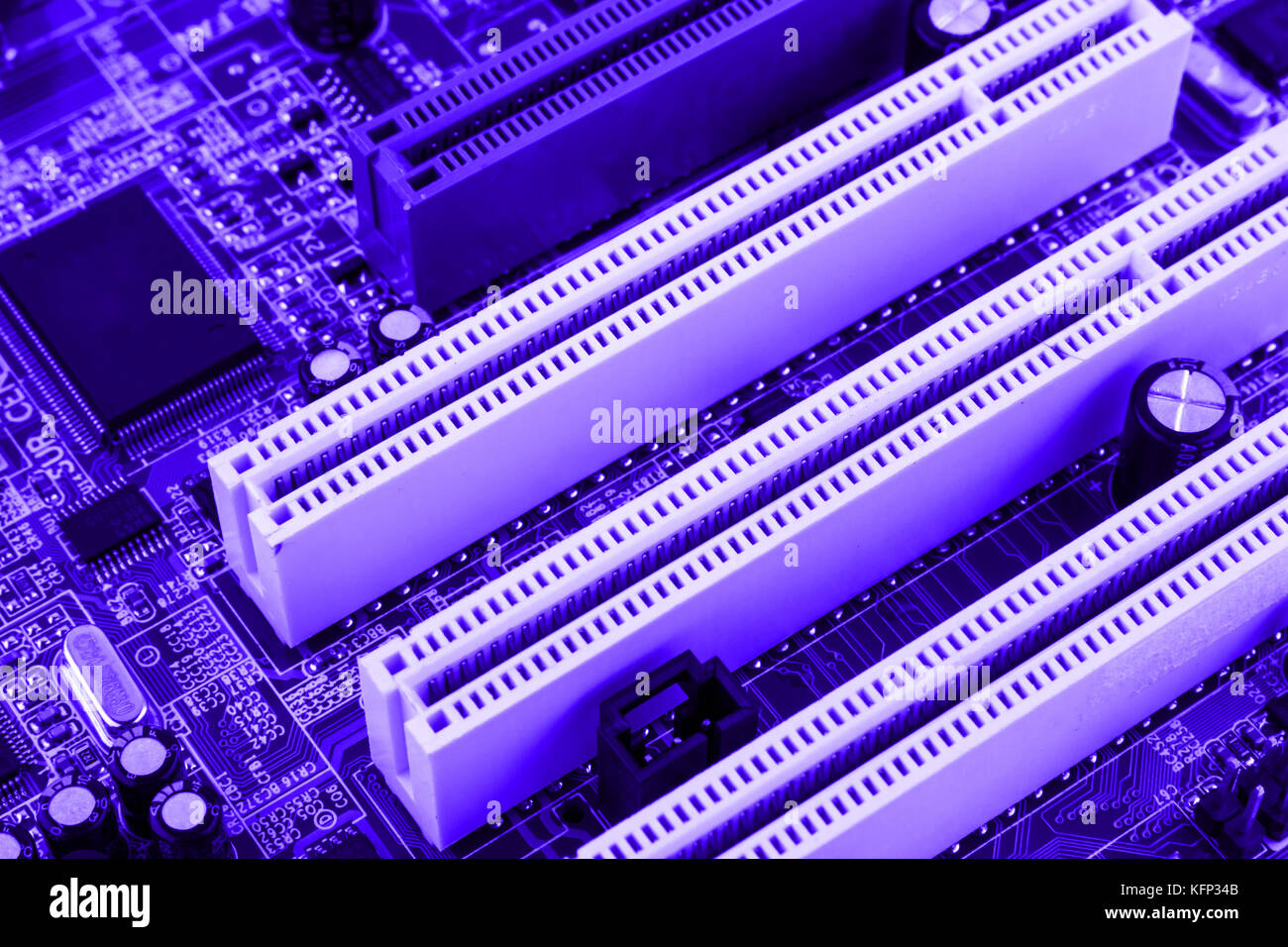 PCI connector slot in motherboard PC toned macro Stock Photo - Alamy