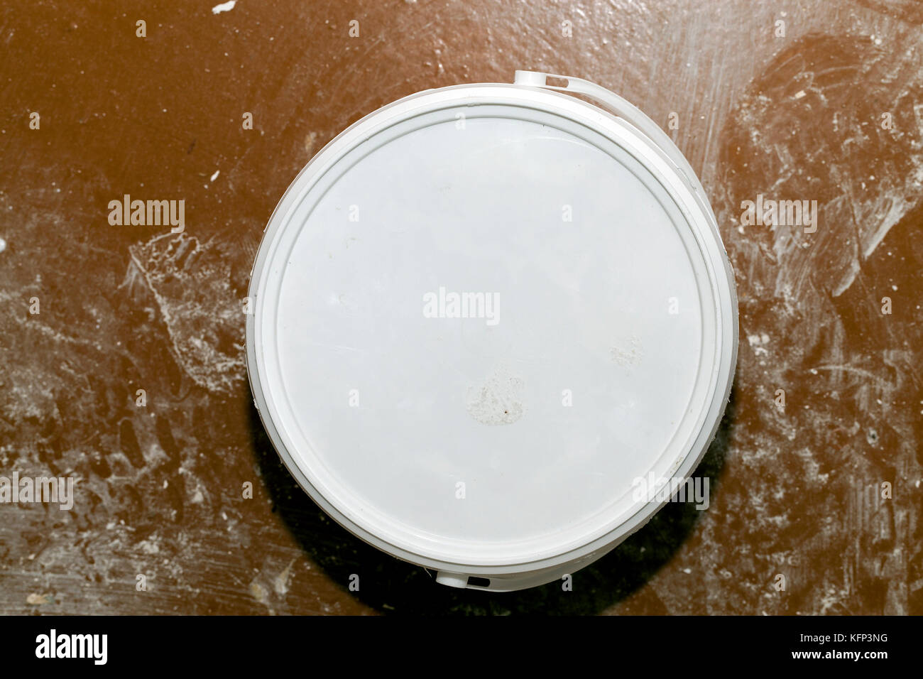 white can with paint repair Stock Photo - Alamy