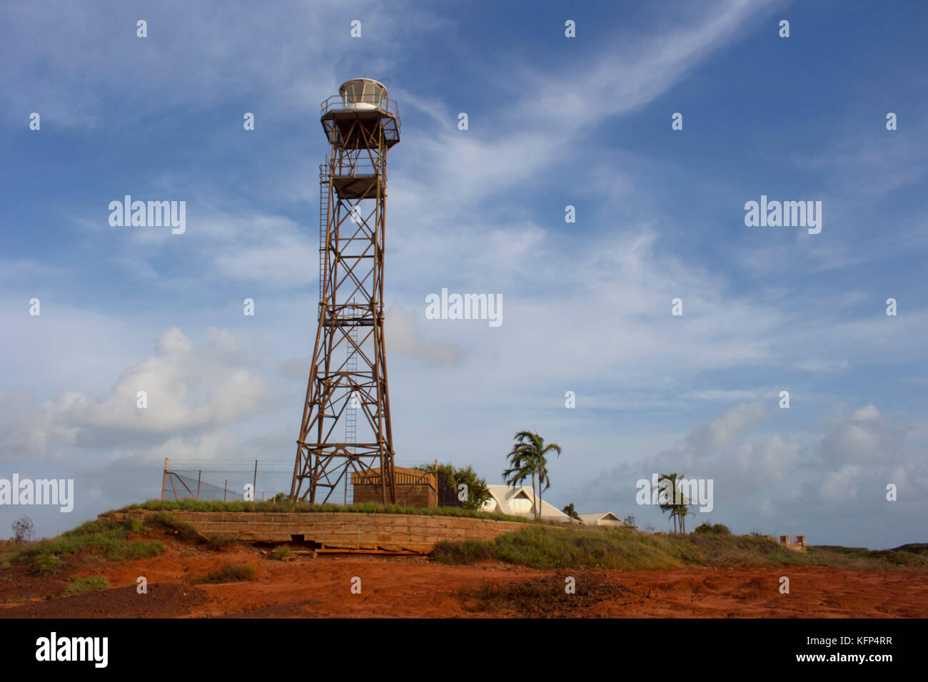 Skeletal stainless steel tower and electric light lighthouse on ...