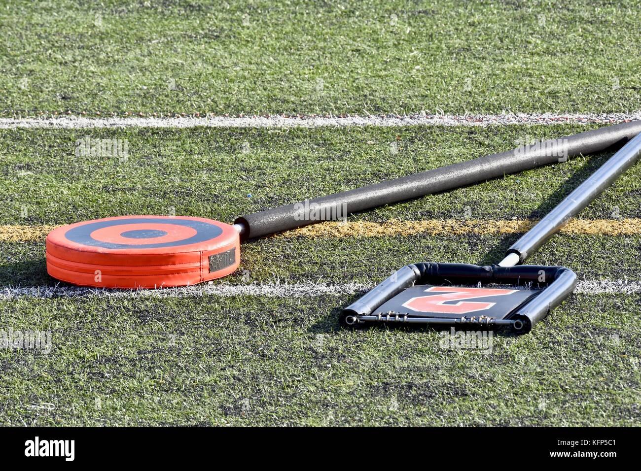 Football field yard markers laying on the sideline Stock Photo - Alamy