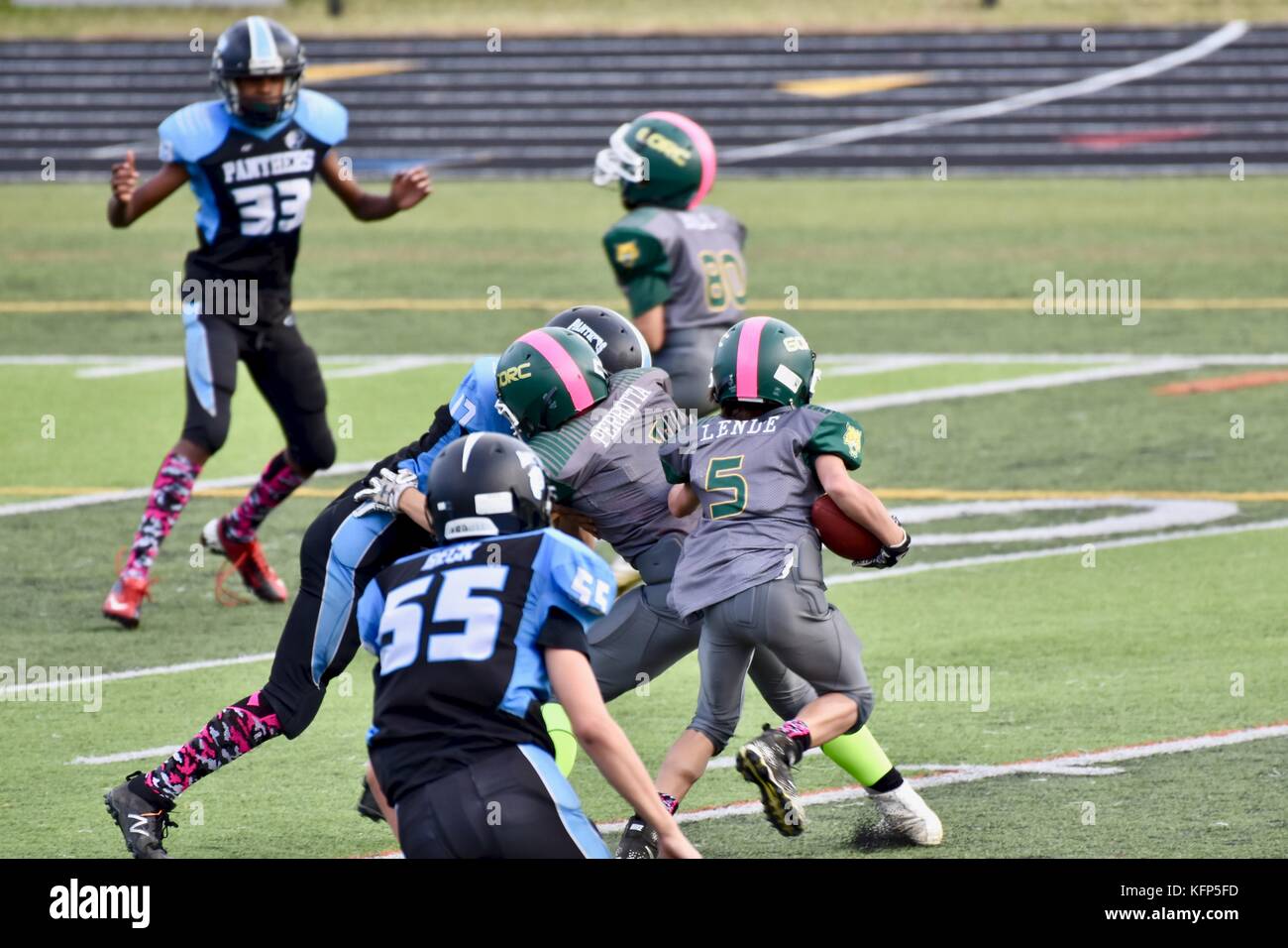 American youth tackle football Stock Photo - Alamy