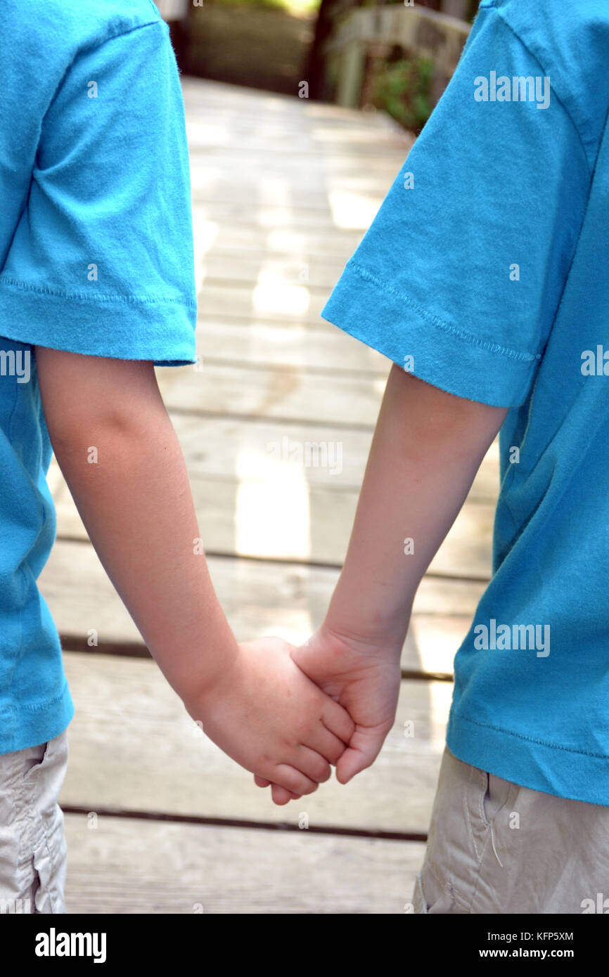 Children holding hands Stock Photo - Alamy