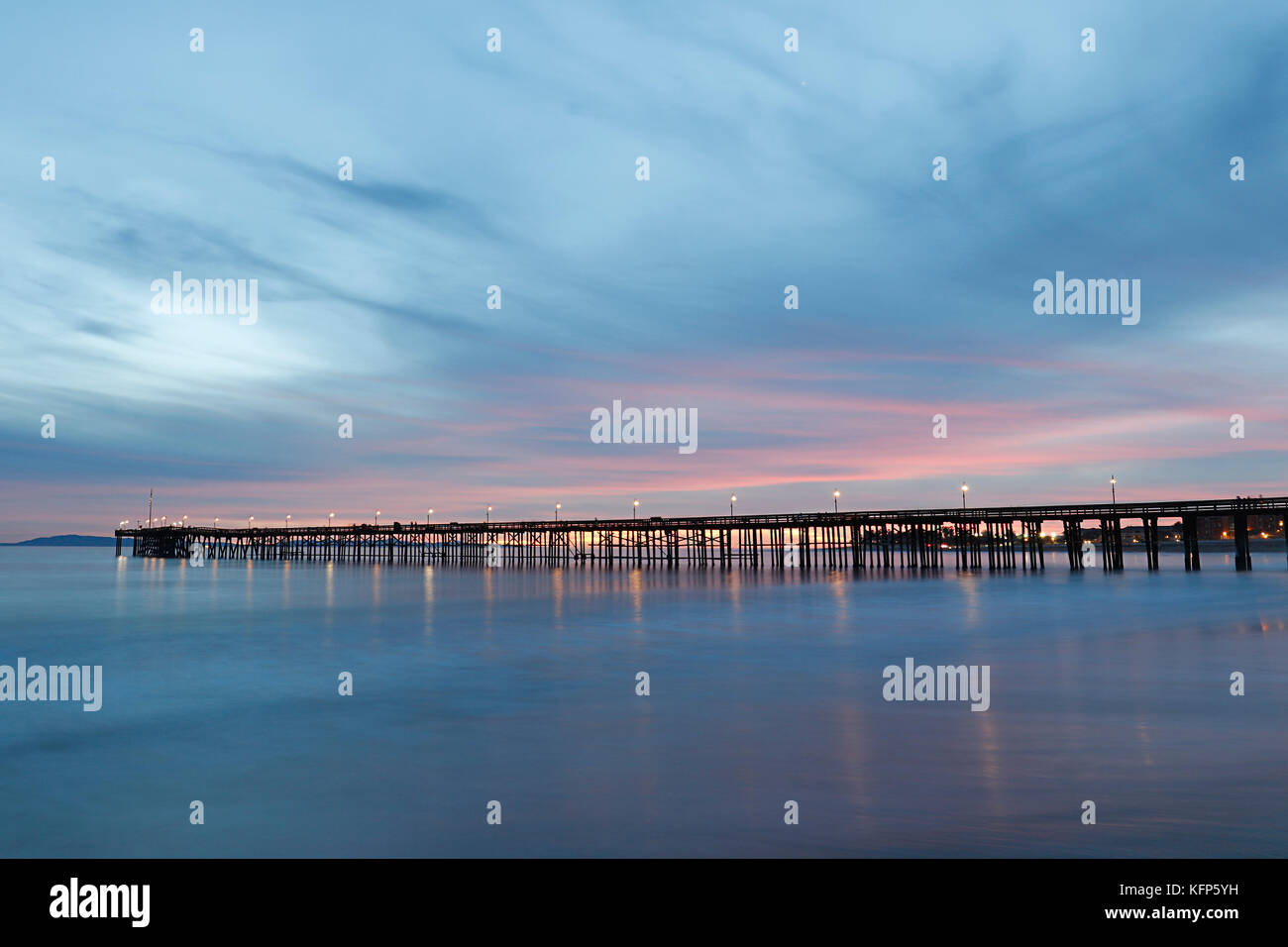 Milky Delicate Blue Ocean and Peer Stock Photo - Alamy