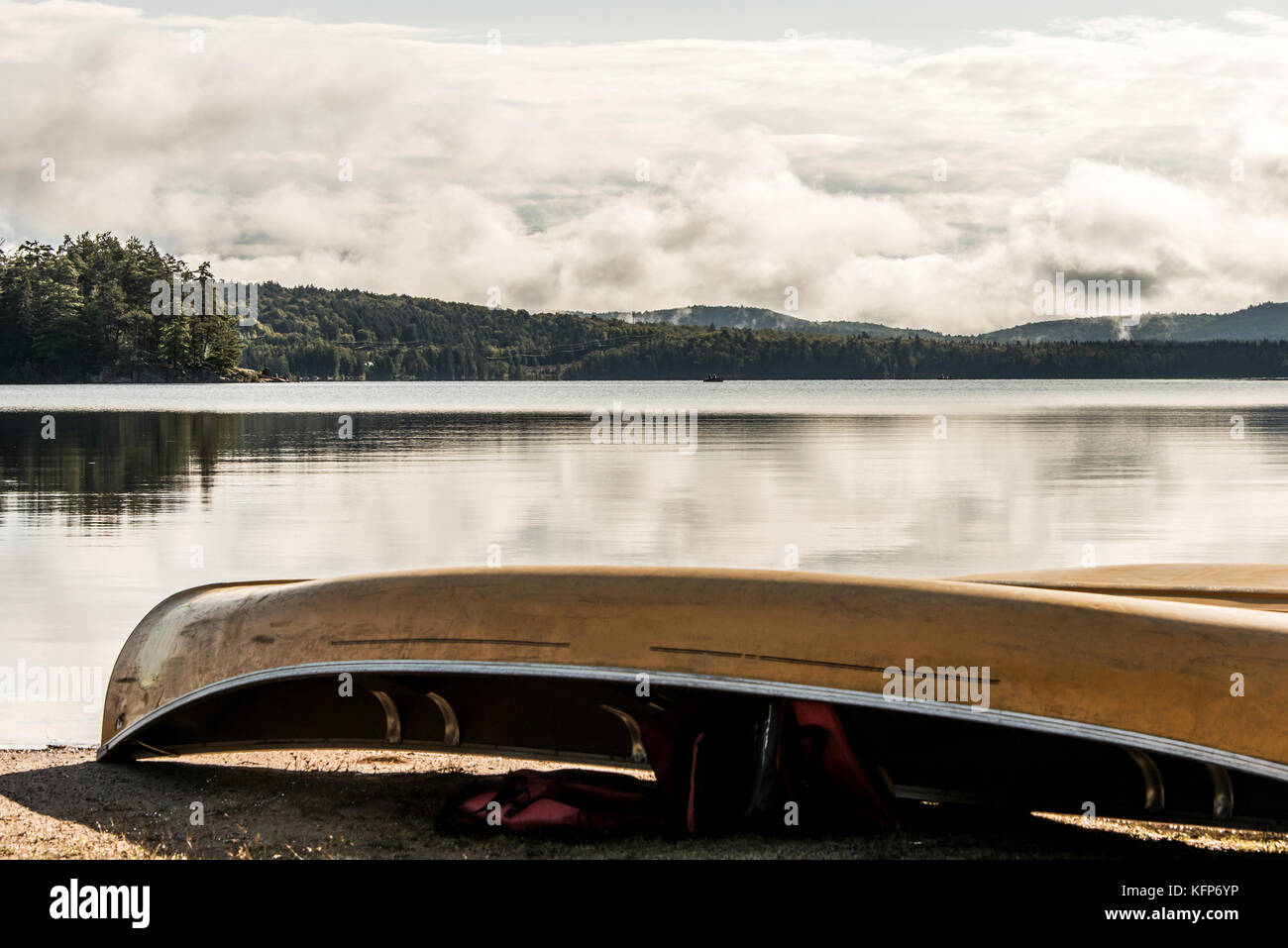 Canada Ontario Lake of two rivers Canoe Canoes parked on beach near the ...