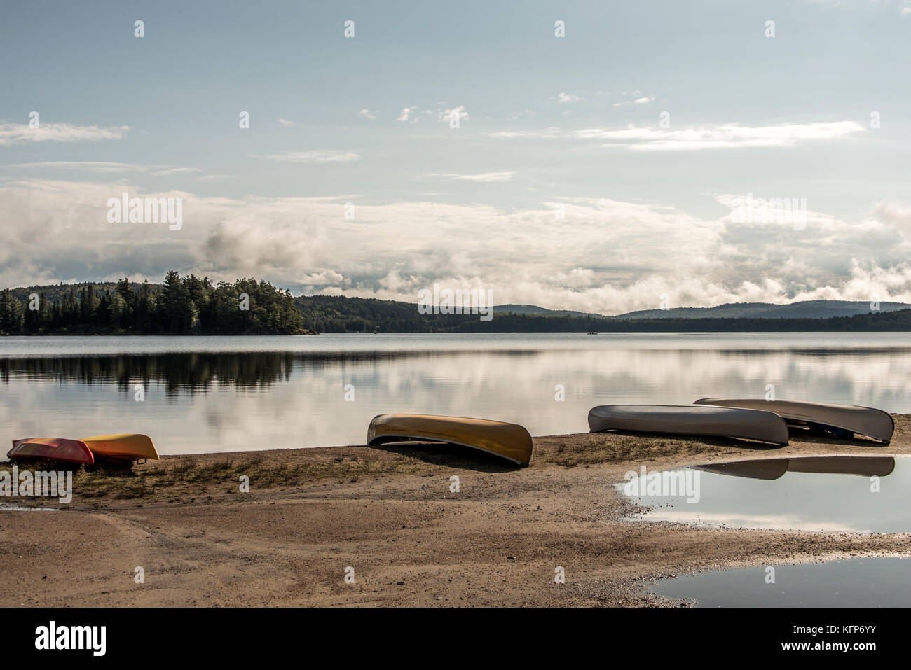 Canada Ontario Lake of two rivers Canoe Canoes parked on beach near the ...