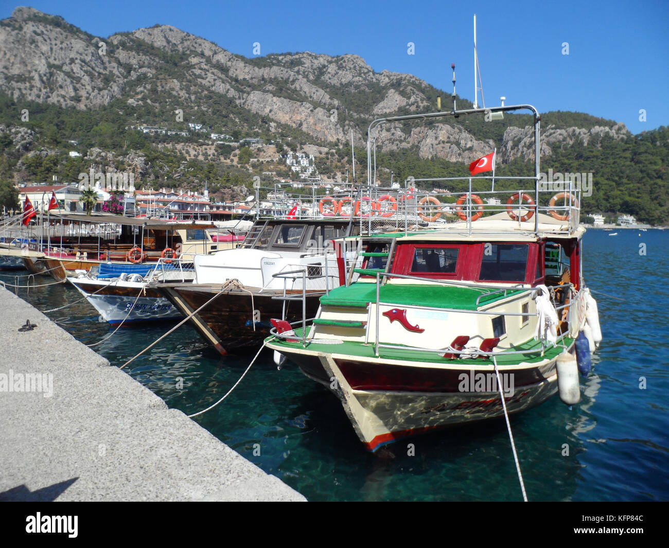 Pleasure craft and taxi boats moored in Turunc harbour, Turkey, Europe ...