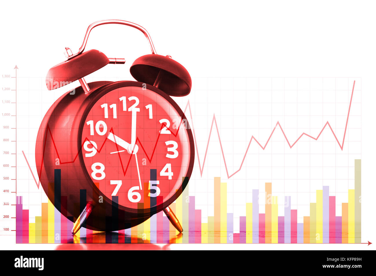 Black color vintage alarm clock on bright table with financial graph ...