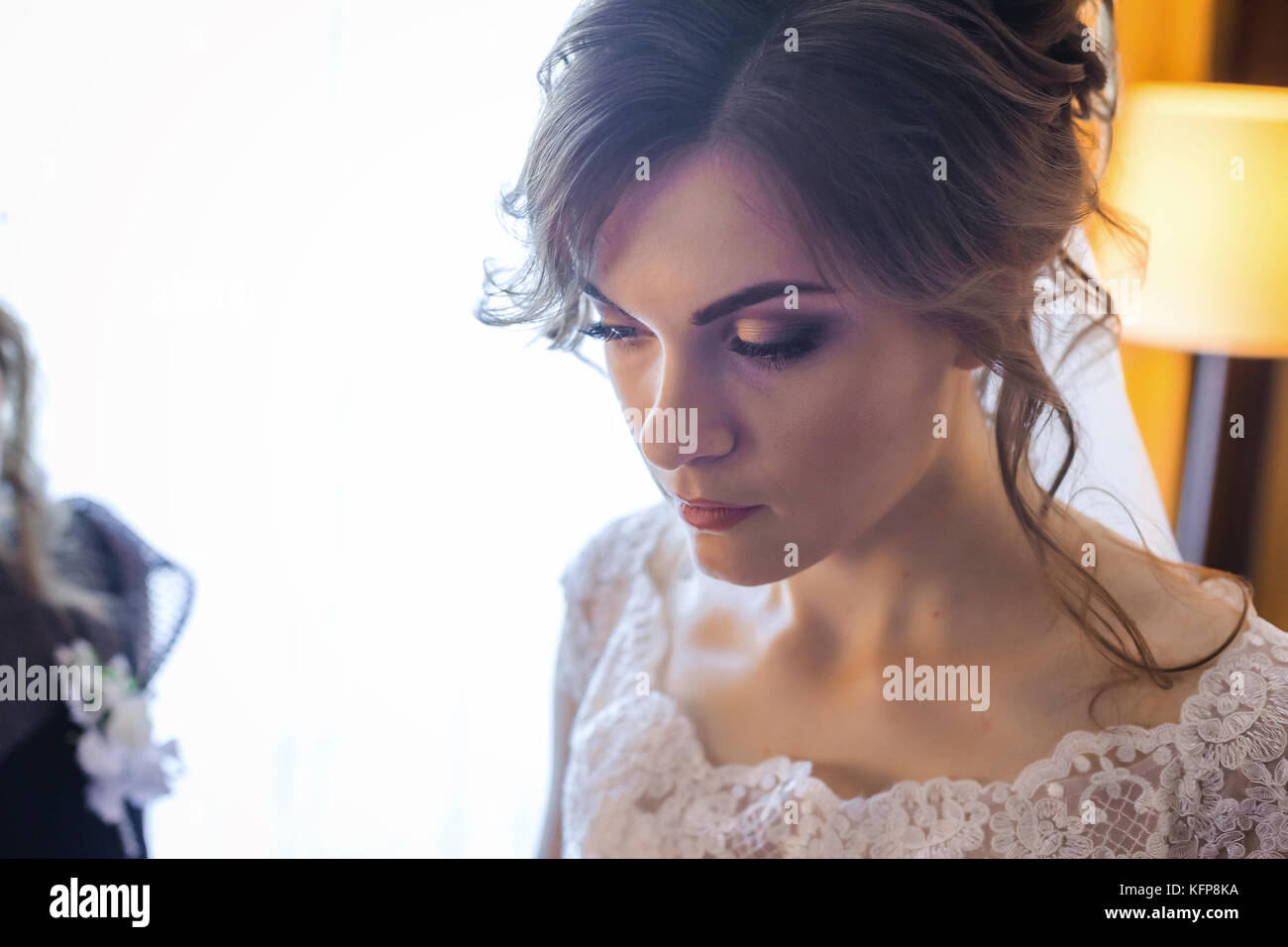 Thoughtfull bride looking for groom Stock Photo - Alamy