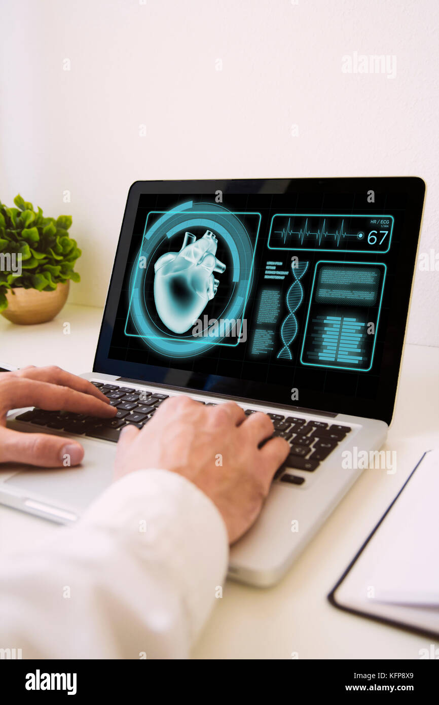 doctor using laptop showing health app Stock Photo - Alamy
