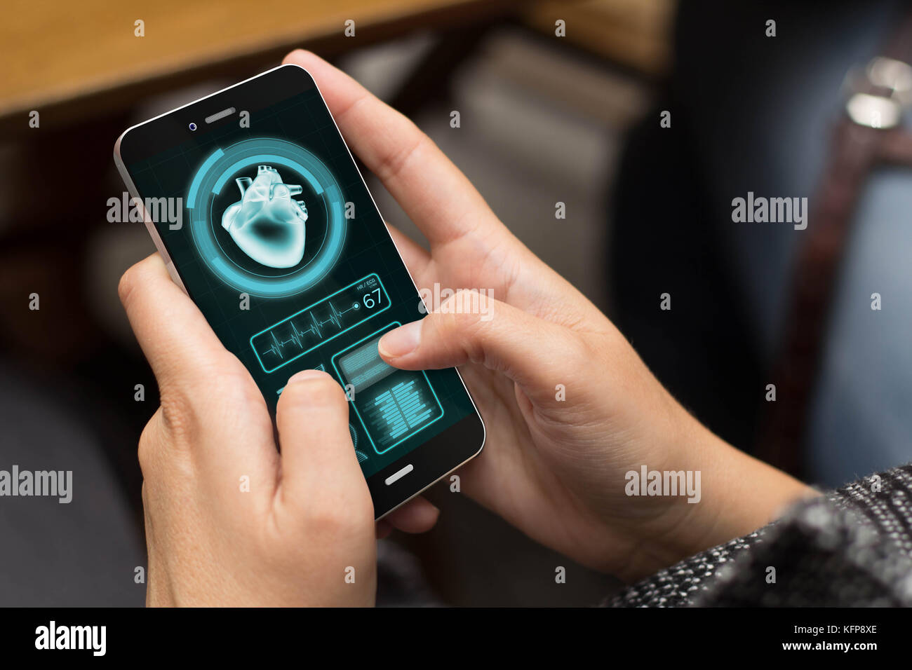 health and technology concept: girl using a digital generated phone ...
