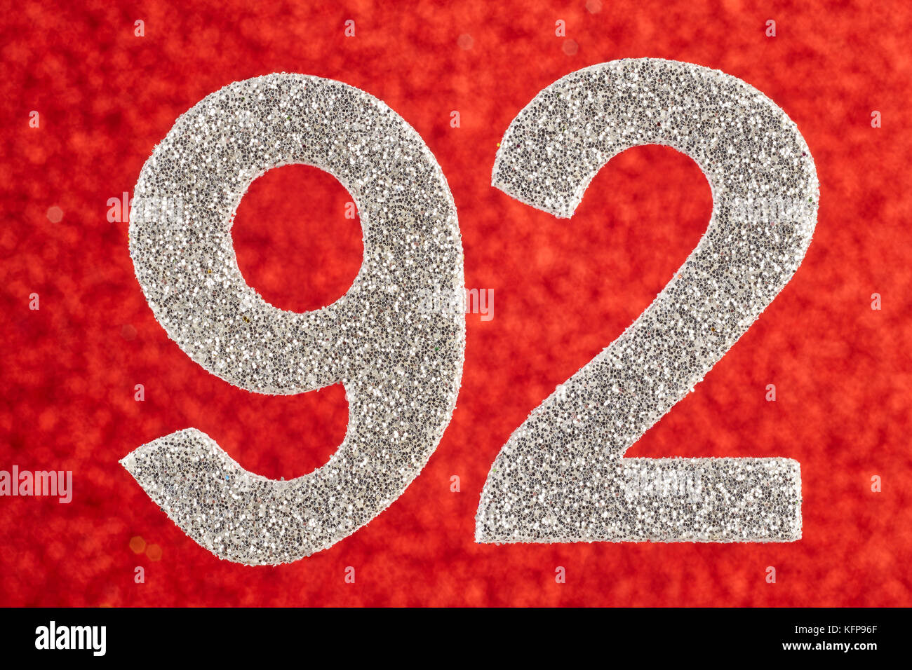 Number ninety-two silver color over a red background. Anniversary ...