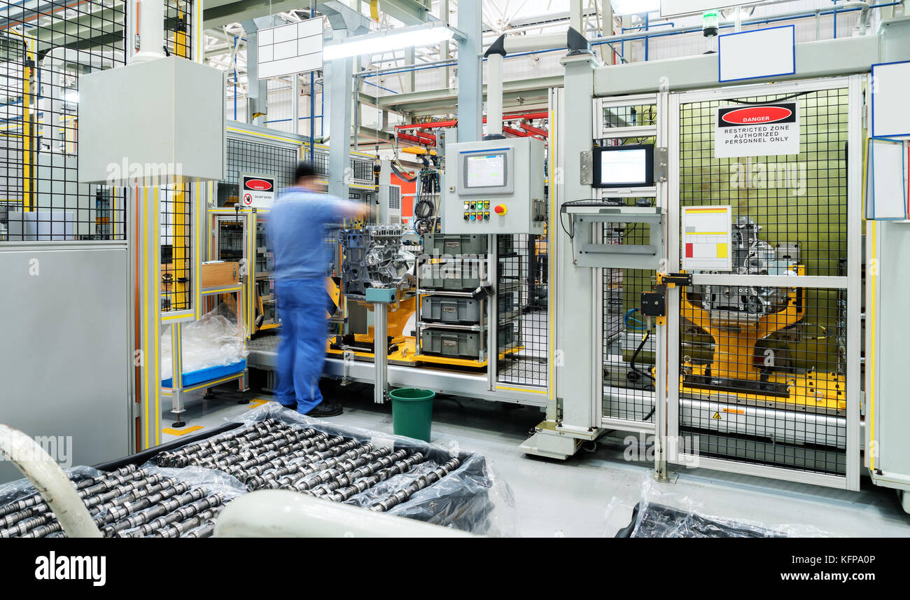 Car production line, skilled workers are working tense Stock Photo - Alamy