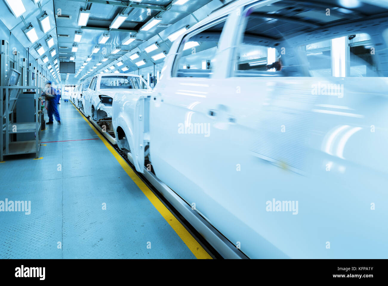 Car production line, skilled workers are working tense Stock Photo - Alamy
