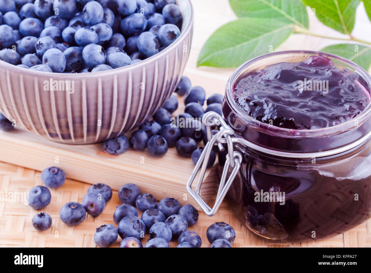 Blueberry fruits jam in the kitchen on the table Stock Photo - Alamy