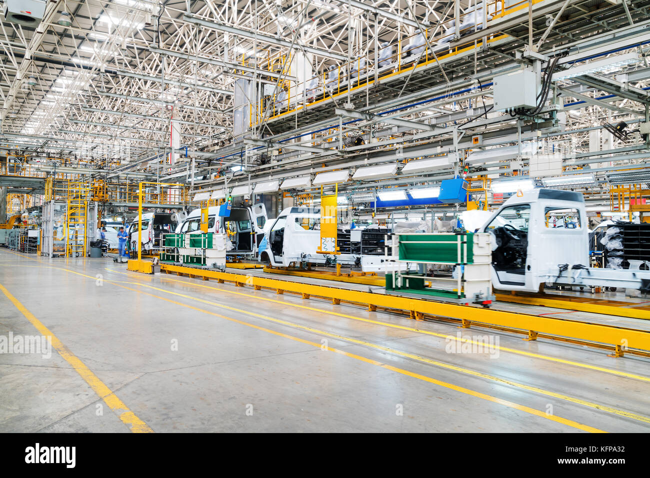Car production line, skilled workers are working tense Stock Photo - Alamy