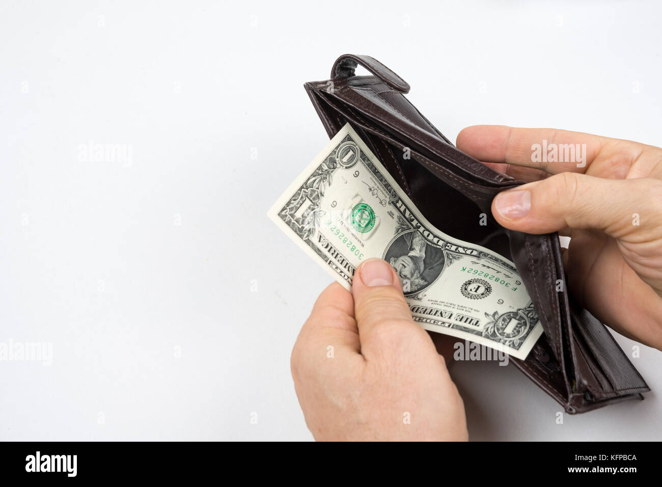 Empty wallet with one dollar on thr white background Stock Photo - Alamy