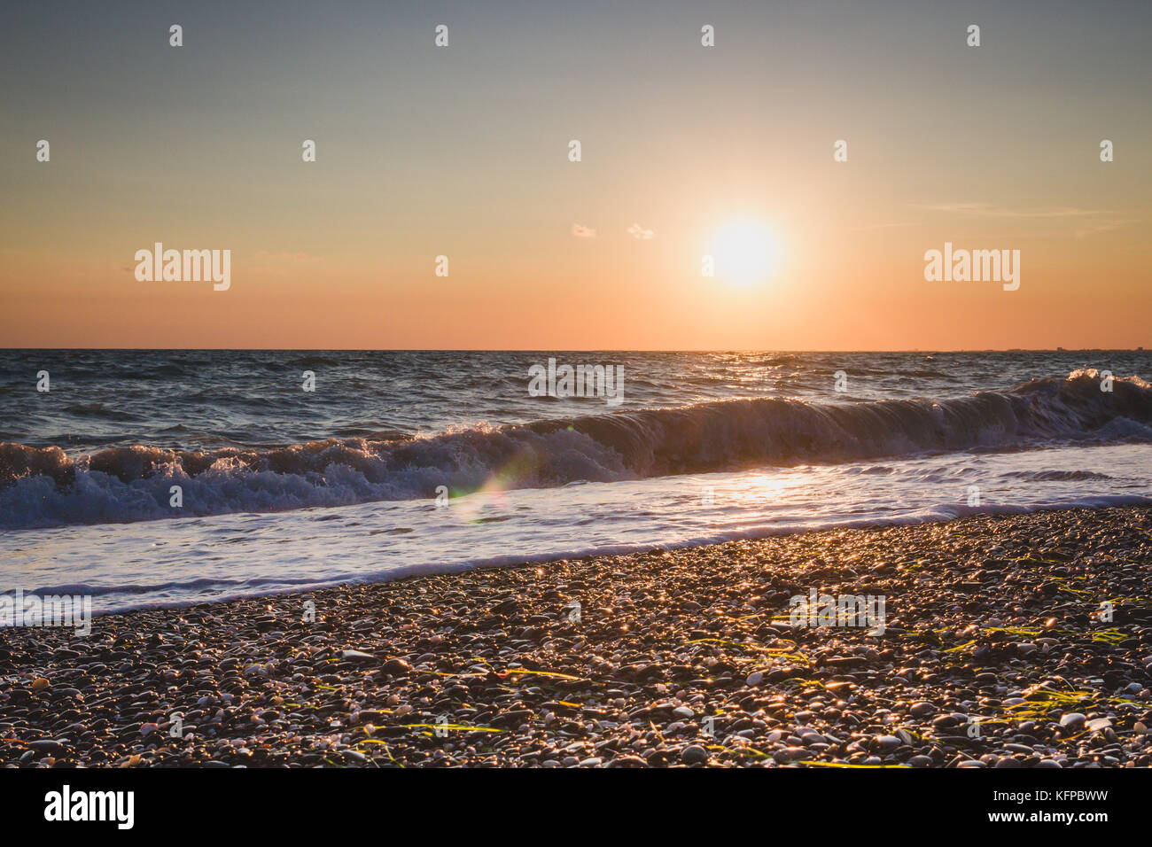 Beautiful sunset on the summer sea Stock Photo - Alamy