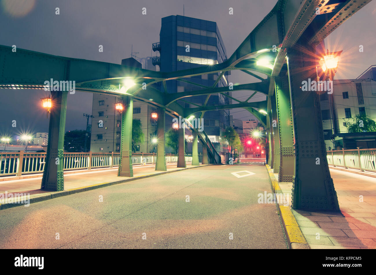 empty well illuminated night driveway in Tokyo, Japan Stock Photo - Alamy