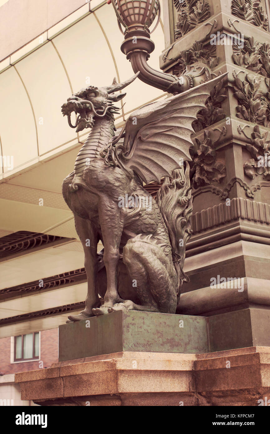 sculpture of Japanese Dragon at famous Nihombashi Bridge under city ...