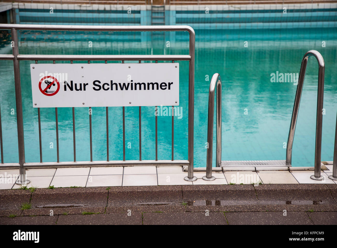 Public swimming pool, closed for the season, in fall Stock Photo - Alamy