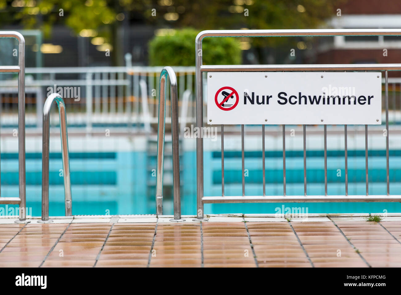 Public swimming pool, closed for the season, in fall Stock Photo - Alamy