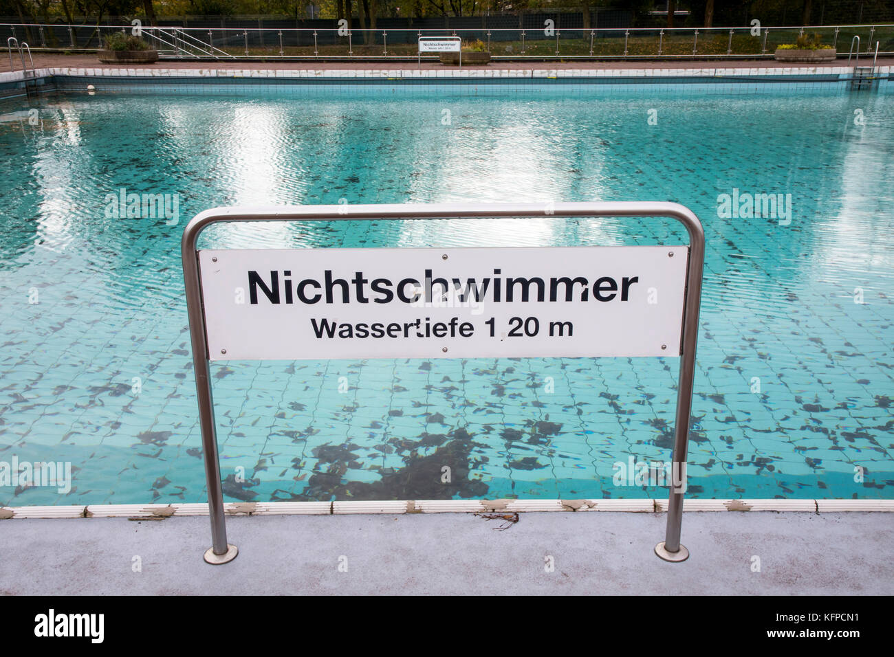 Public swimming pool, closed for the season, in fall Stock Photo - Alamy