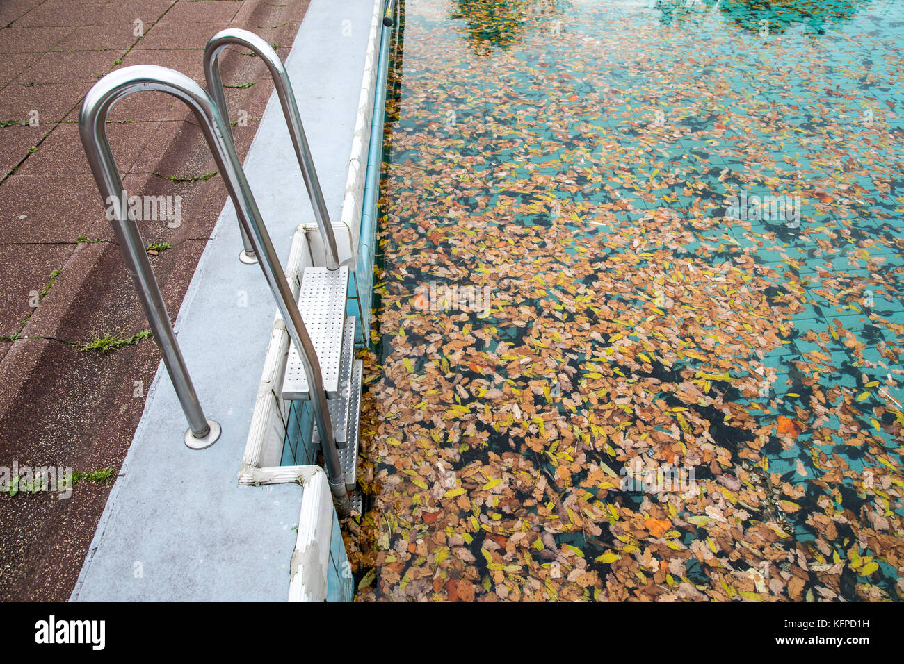 Public swimming pool, closed for the season, in fall Stock Photo - Alamy
