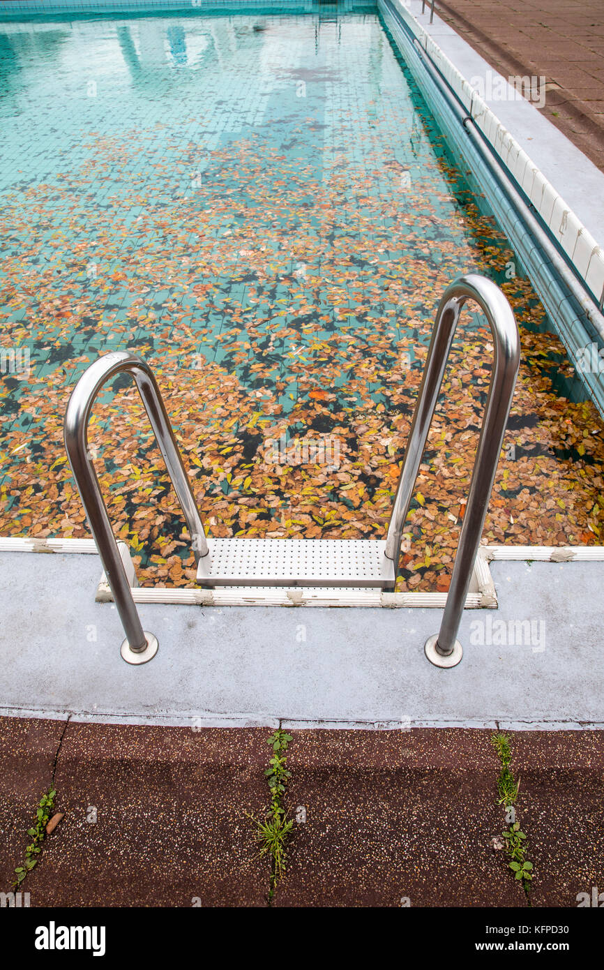 Public swimming pool, closed for the season, in fall Stock Photo - Alamy