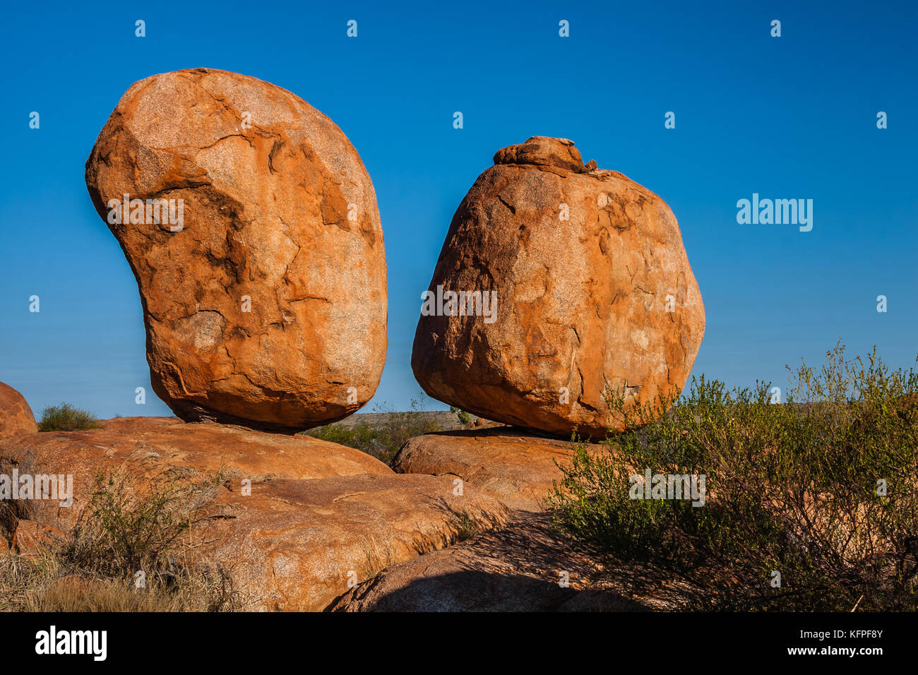 Two balancing boulders in the Devils Marbles Conservation Reserve ...