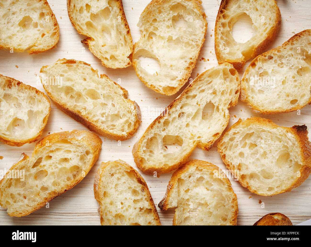 small sliced slices of bread against white background Stock Photo - Alamy