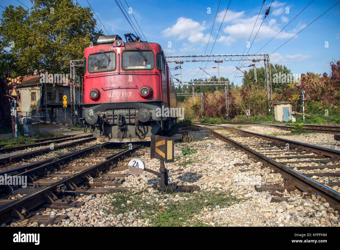 Serbia - Train crossing an intersection Stock Photo - Alamy