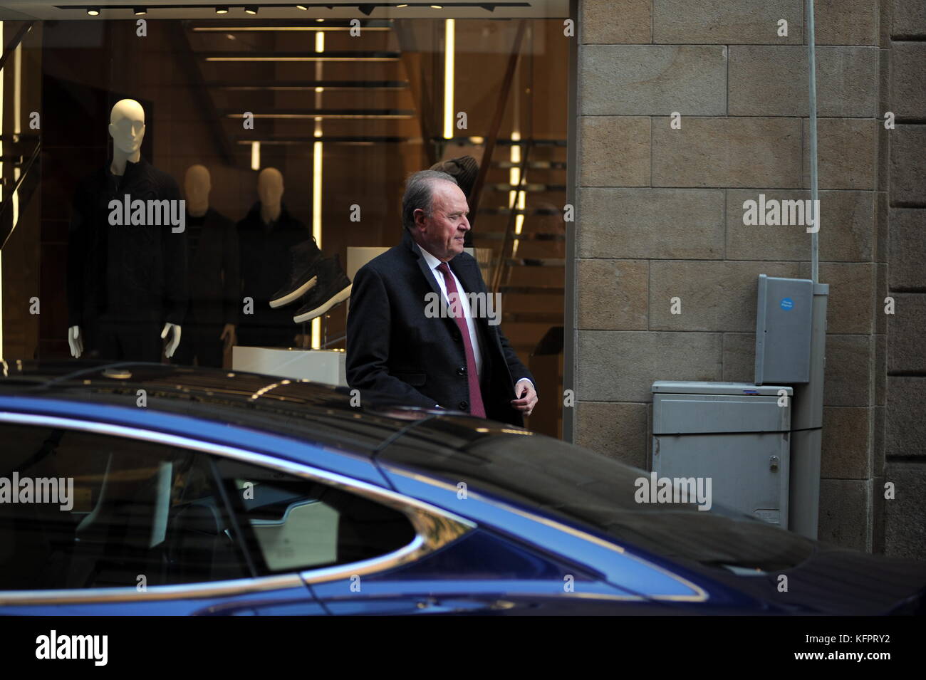 Milan, Ennio Doris shopping downtown with driver Ennio Doris, president ...