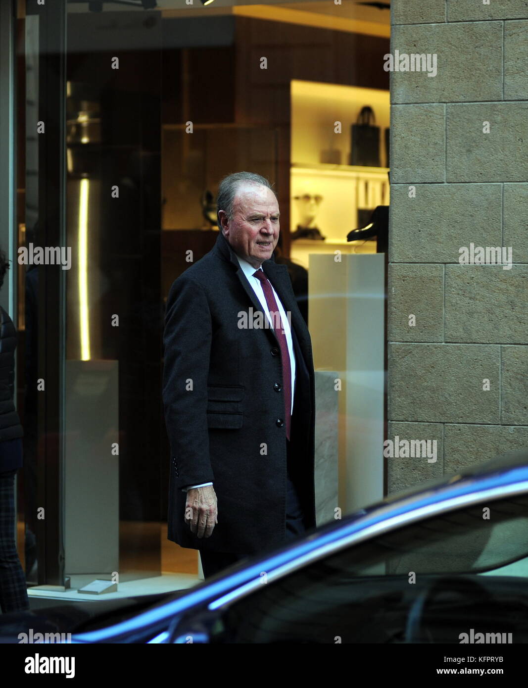 Milan, Ennio Doris shopping downtown with driver Ennio Doris, president ...
