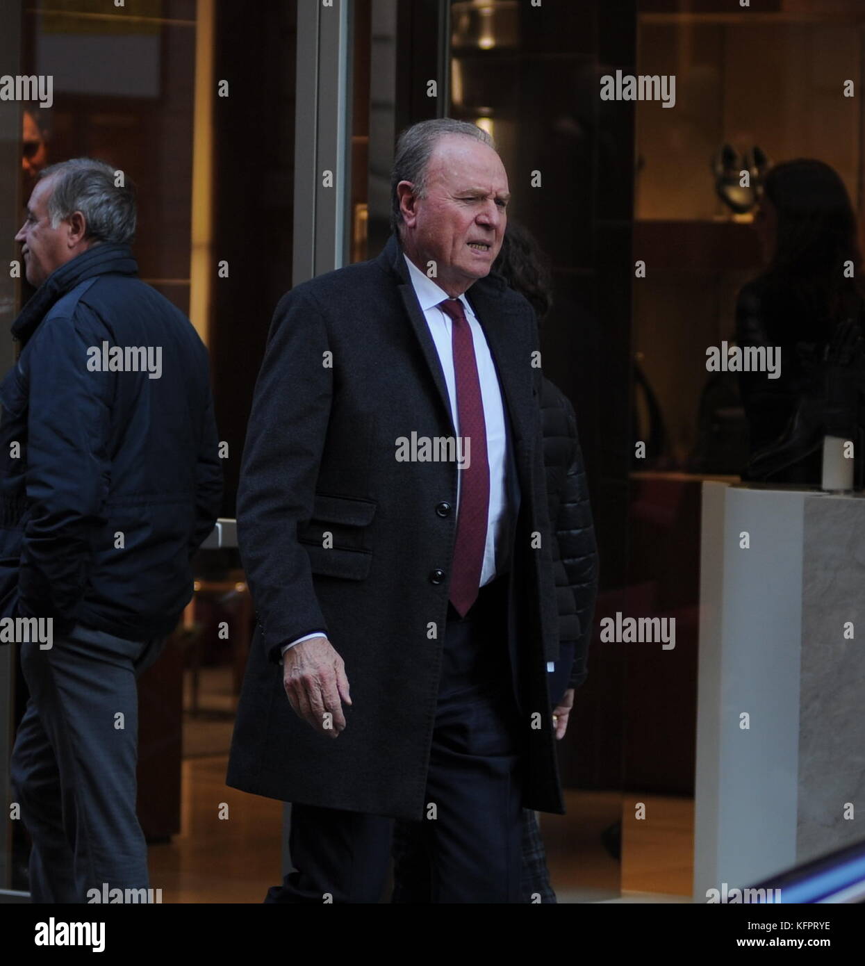 Milan, Ennio Doris shopping downtown with driver Ennio Doris, president ...